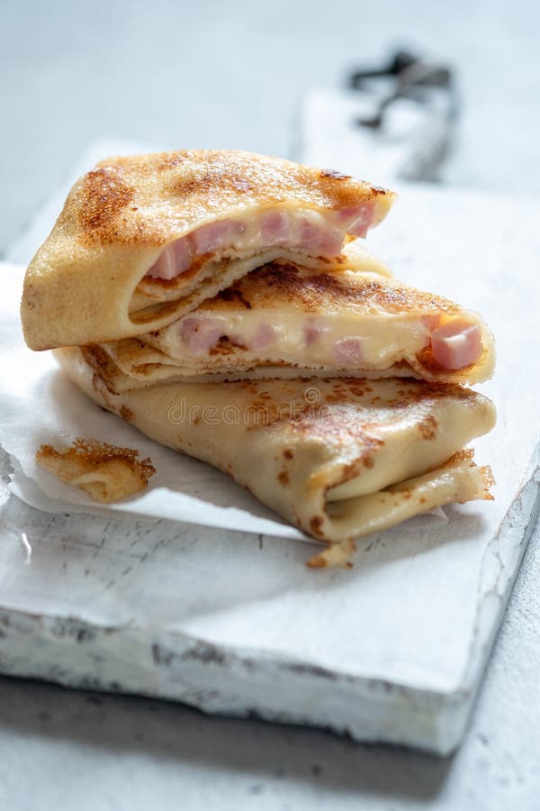 Crepes with ham and cheese stock image. Image of crepes - 141697179