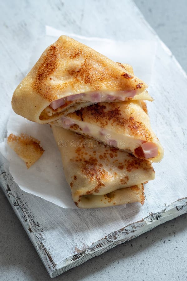 Crepes with ham and cheese stock image. Image of tasty - 141697473