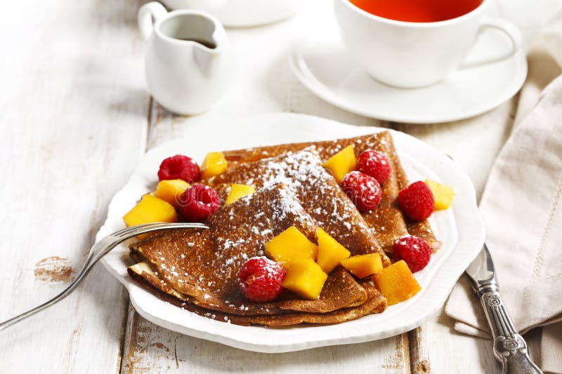 Crepes with Mango and Raspberries Stock Image - Image of plate, mango ...