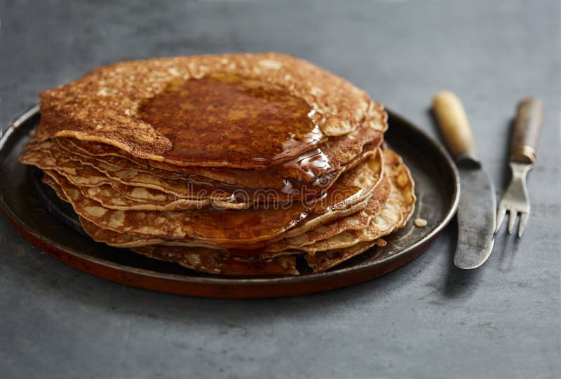 Crepes with maple syrup stock photo. Image of brown - 140956270