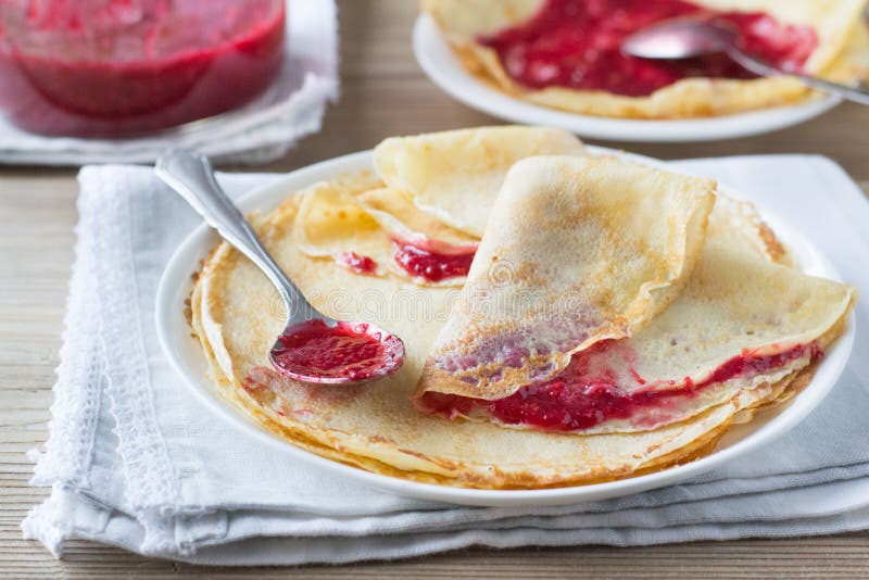 Crepes with raspberry jam stock image. Image of breakfast - 36103101