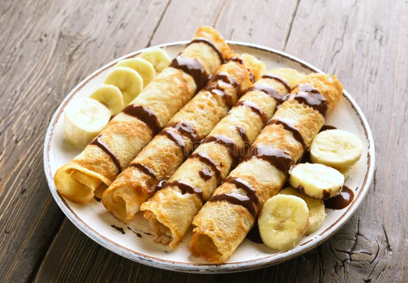 Crepes Roll with Banana Slices Stock Photo - Image of closeup, brunch ... Crepes Roll with Banana Slices Stock Photo - Image of closeup, brunch ...