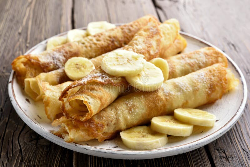 Crepes Roll with Banana Slices Stock Photo - Image of closeup, brunch ... Crepes Roll with Banana Slices Stock Photo - Image of closeup, brunch ...