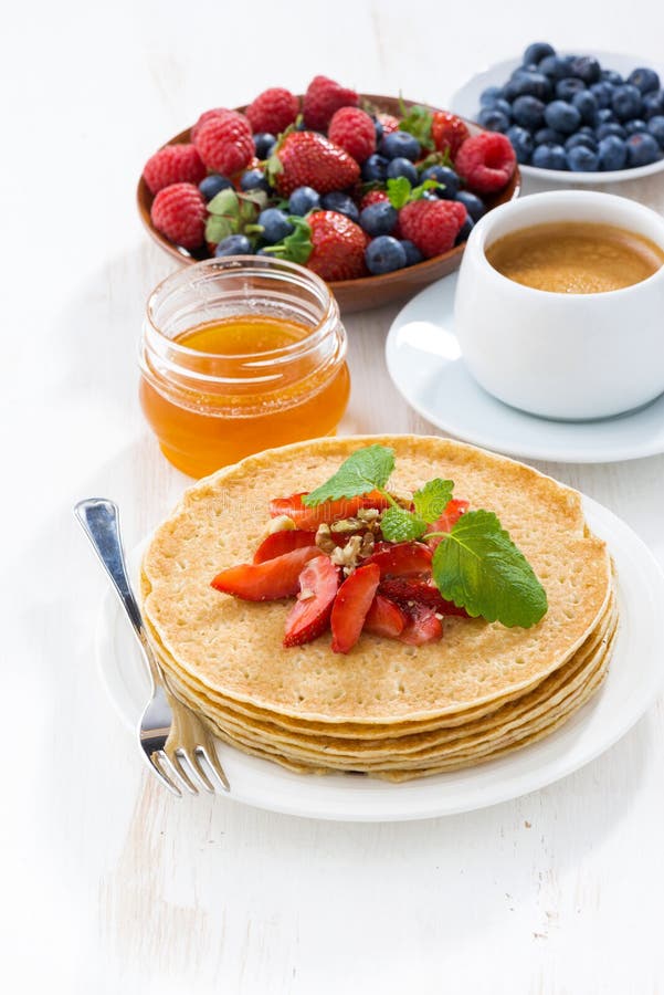 Crepes with Strawberries and Honey for Breakfast, Vertical Stock Image ...