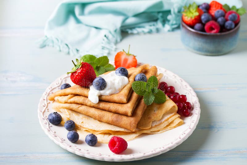 Crepes, Thin Pancake Stack with Yogurt and Berries. Stock Photo - Image ...