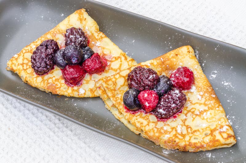Crepes with wild berries stock photo. Image of pancake - 72628364