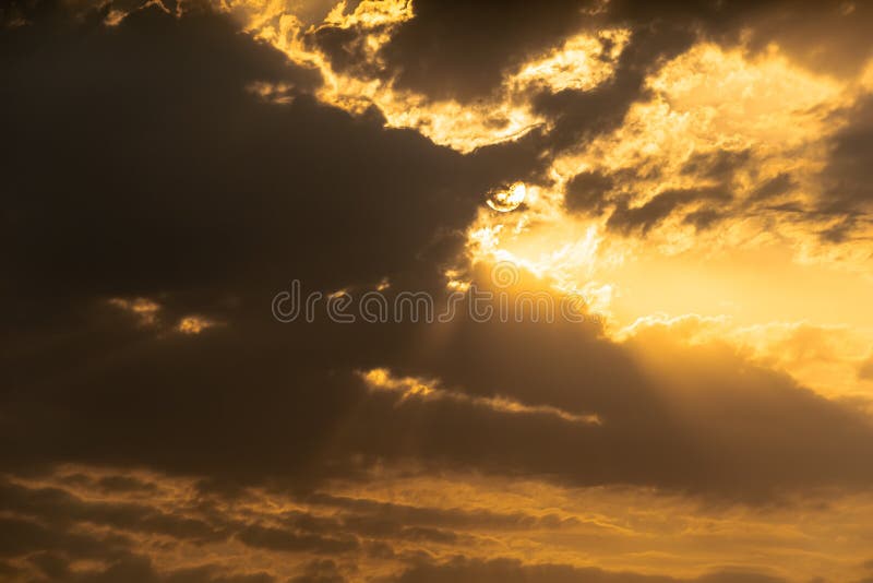 Crepuscular Rays of the Sun Streaming through Dark Clouds Stock Image ...