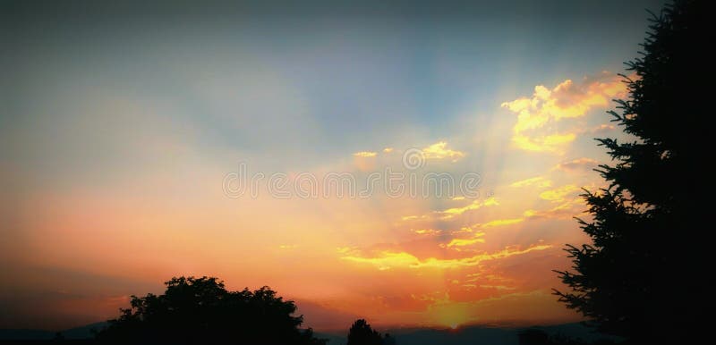Crepuscular sunset stock image. Image of sunset, silhouette - 97757785