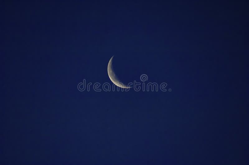 Crescent Moon on Clear Blue Sky Stock Photo - Image of encompassing ...