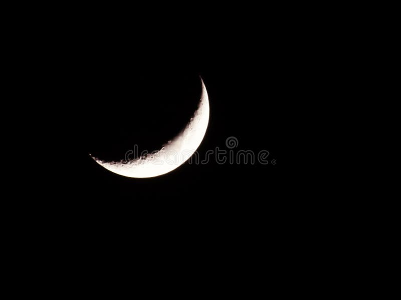 Crescent Moon on dark sky stock photo. Image of astro - 124002940