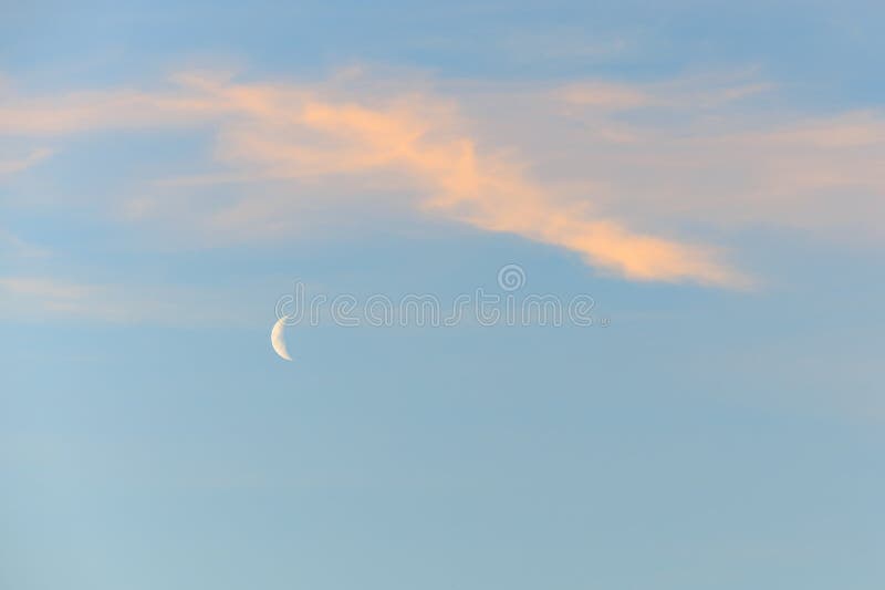 Crescent Moon in Daytime Sky with Soft Pink Clouds Stock Photo - Image of calm, blue: 354752396