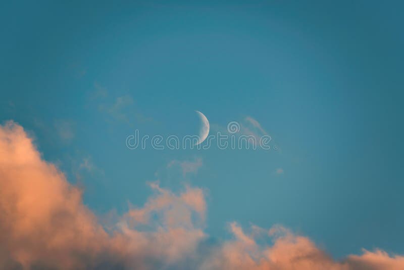 Crescent Moon Glowing and Evening Cloud on Blue Sky Stock Image - Image ...