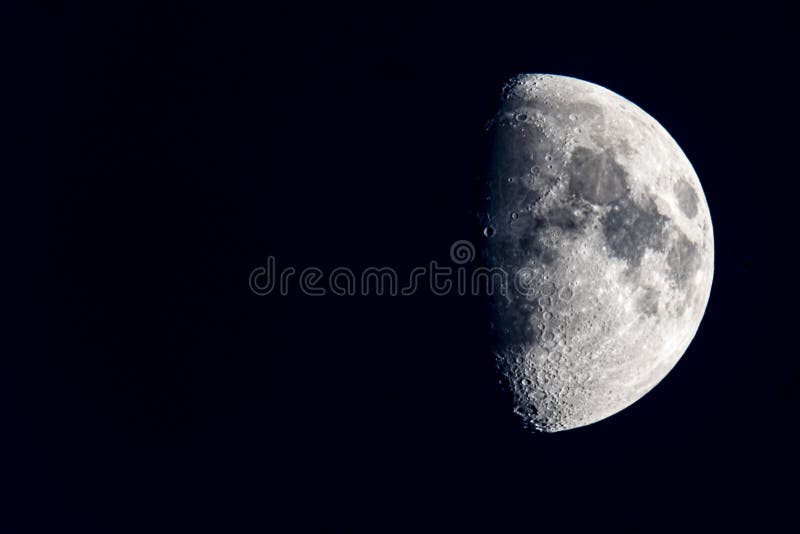 Crescent Moon with Many Recognizable Lunar Craters Stock Image - Image ...