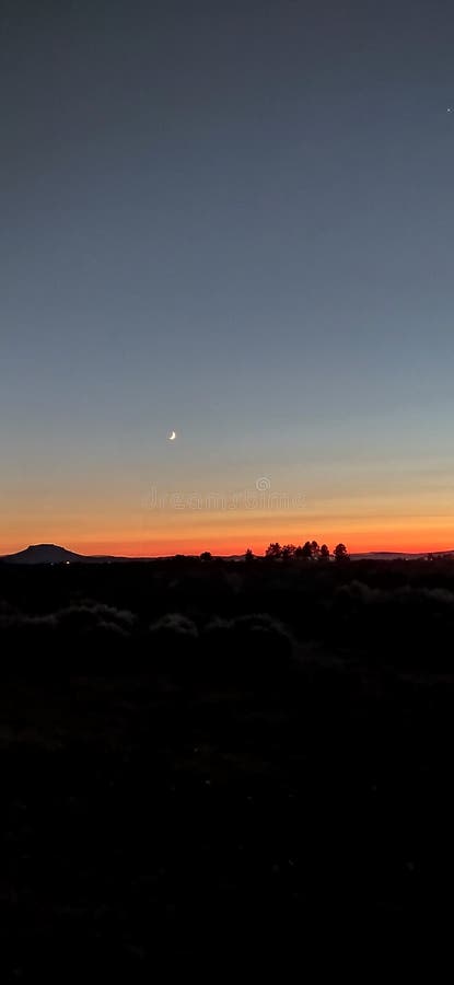 Crescent Moon with Orange Sunset Stock Photo - Image of darkness, cloud ...