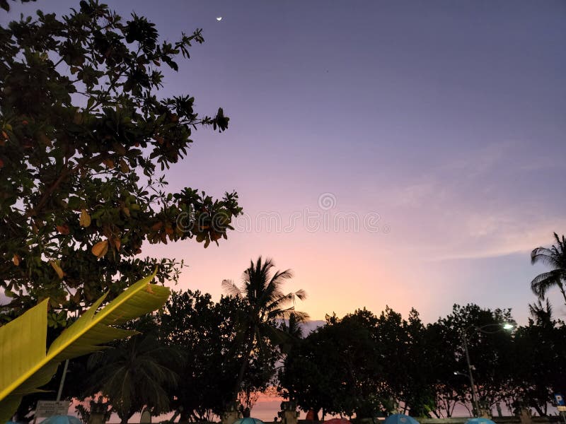 Sunset at Kuta Beach Bali stock image. Image of sunrise - 264115285