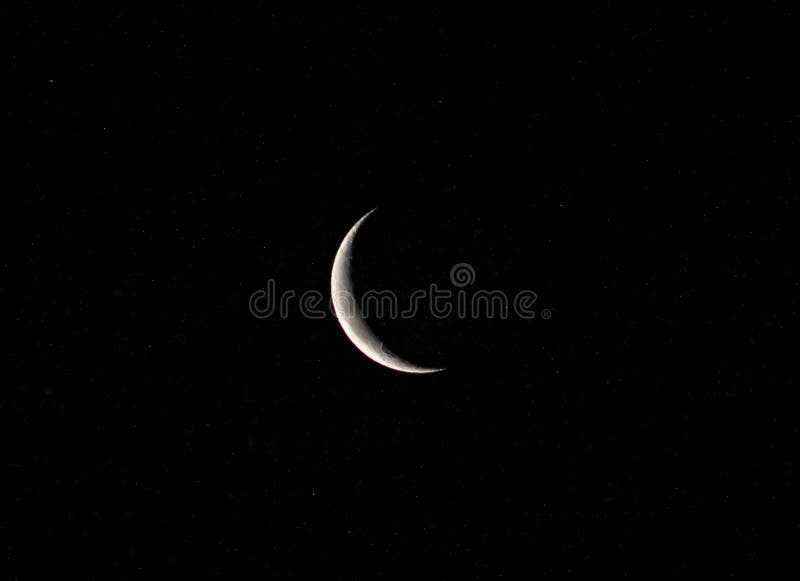 Crescent Phase of the Moon Against a Dark Sky Stock Photo - Image of ...