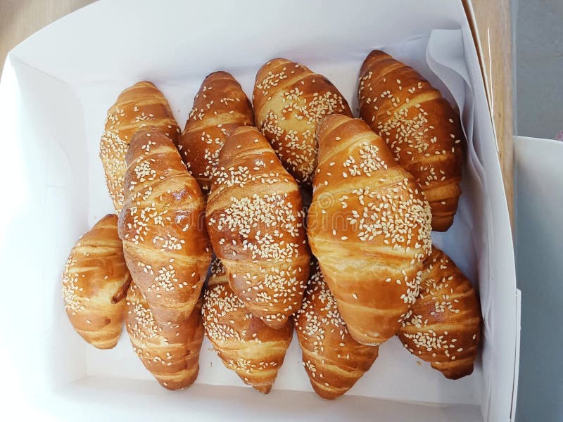 A Crescent-shaped Cookie Known for Its Layered Texture, Which is Crispy ...