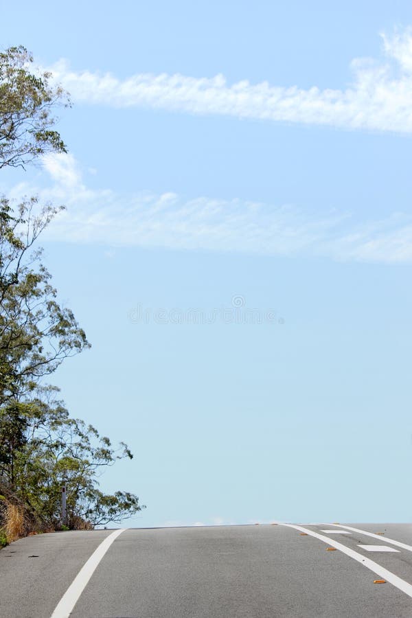 Crest of a Hill with Road Signs Stock Photo - Image of view, hill: 42612326