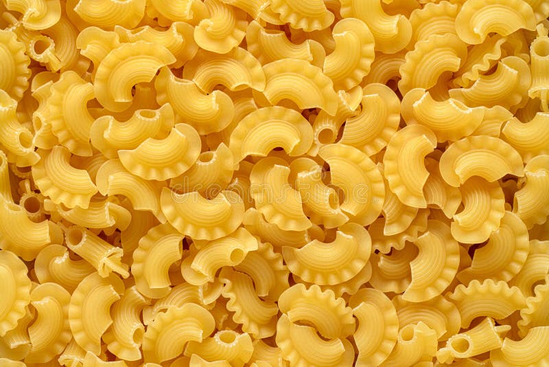 Pasta Spread on a Table Next To Utensils. Stock Image - Image of meal ...