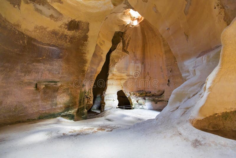 Deep Cave Entrance on a Mountain Slope. Natural Landscape Photo. Stock ...
