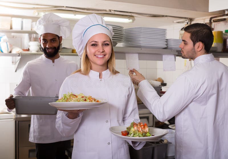 Crew of Professional Cooks Working at Restaurant Stock Photo - Image of ...