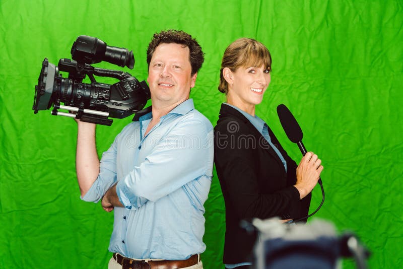 Crew of Reporter and Cameraman Posing in the Studio Stock Image - Image ...