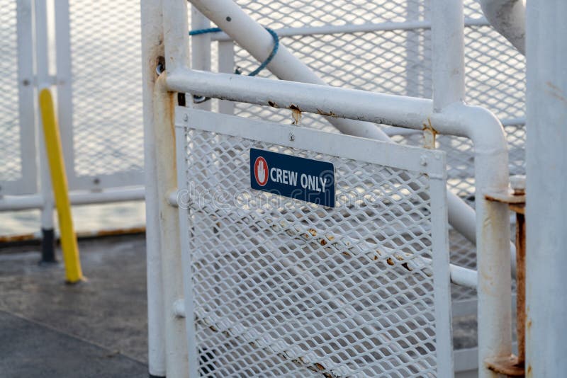 Crew only sign stock photo. Image of spanish, window - 32884548