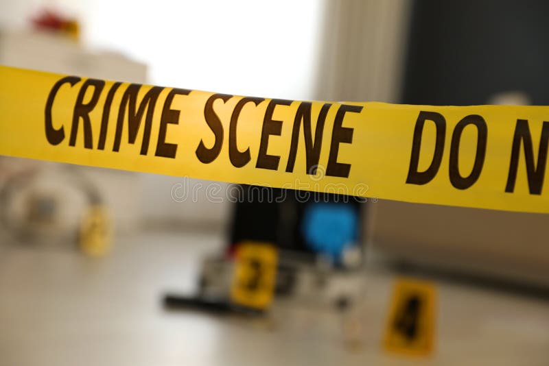 Crime Scene with Evidences and Criminologist Case, Focus on Yellow Tape ...