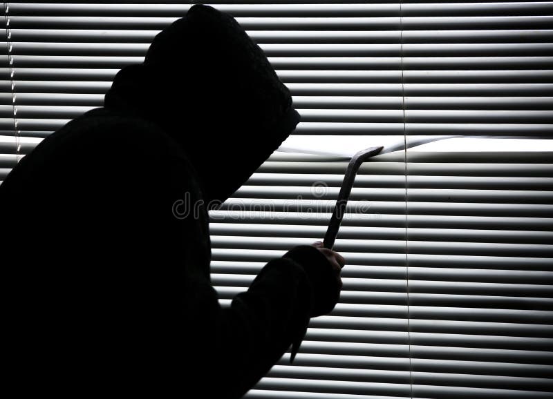 Criminal with Crowbar Near the Doors. Robber Breaking into House Stock ...