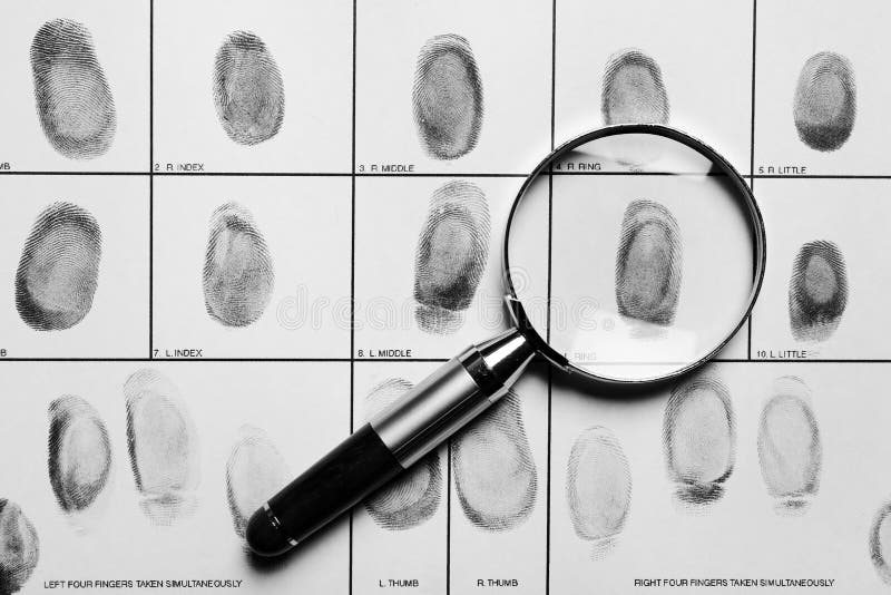 Fingerprint Card on Table, View through Magnifying Glass. Detective ...