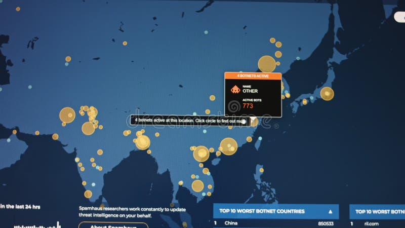 Criminal Hacker Using Computer Pointing To a World Map for Organizing ...