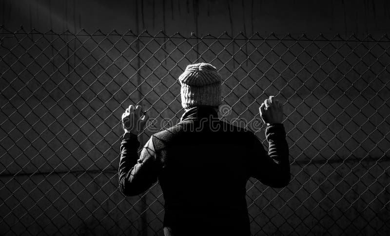 Criminal man on the street stock photo. Image of masculine - 240202304