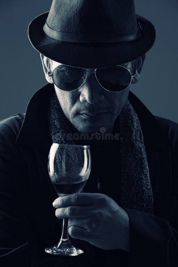 Criminal Mastermind and a Glass of Wine Stock Image - Image of ...