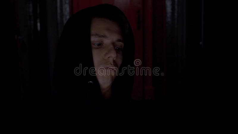 Criminal Programmer in Hood Cracking Code Using Computers in Dark Room ...