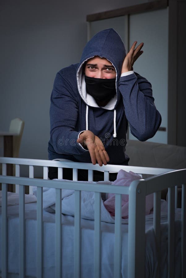 The Criminal Stealing Baby in Human Child Traficking Concept Stock ...