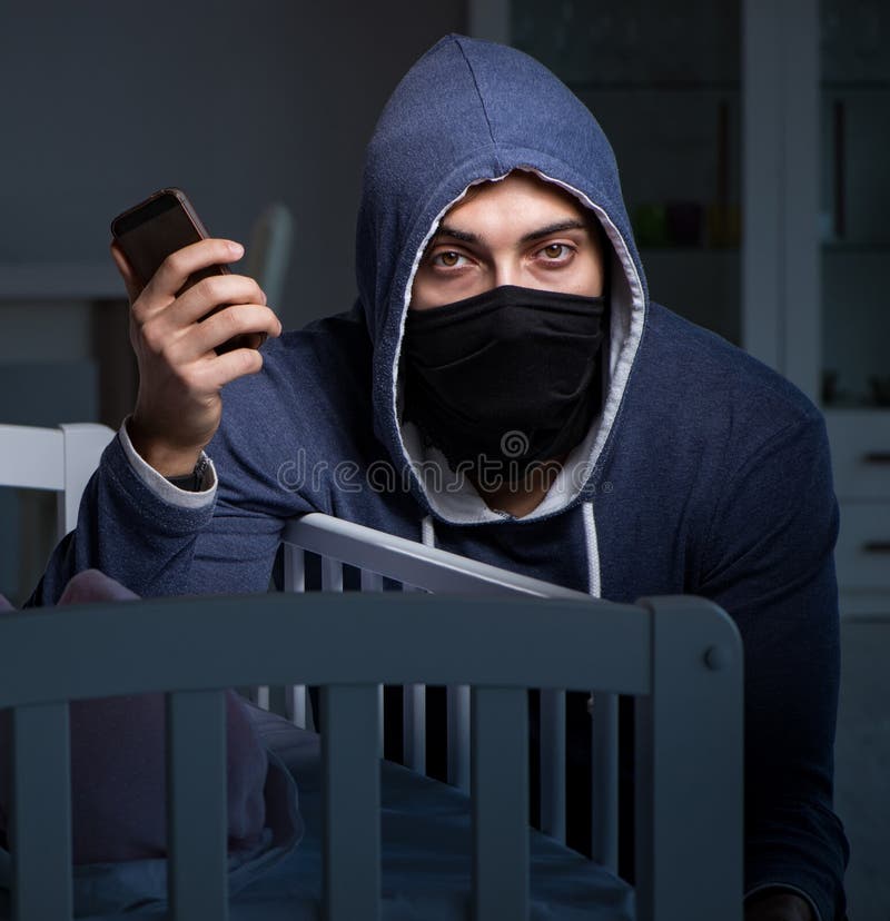 The Criminal Stealing Baby in Human Child Traficking Concept Stock ...