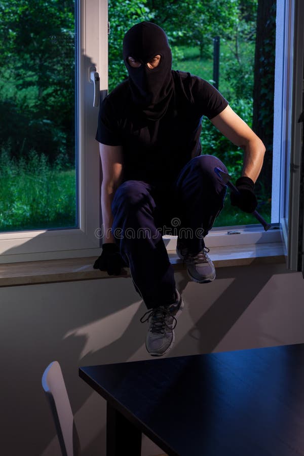 Criminal Wants To Rob a House Stock Image - Image of obscured, crime ...