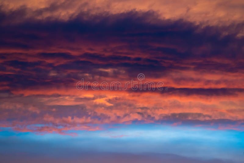 Crimson Clouds in Blue Sky at Sunset Stock Image - Image of light, atmosphere: 328174549