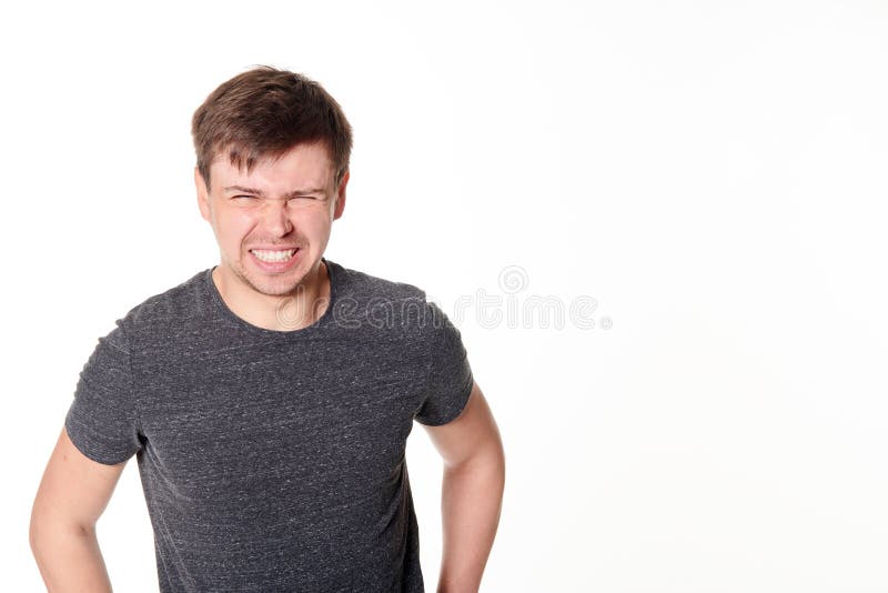 Cringing Young Woman Dipping Tea Bag into Mug Stock Photo - Image of ...
