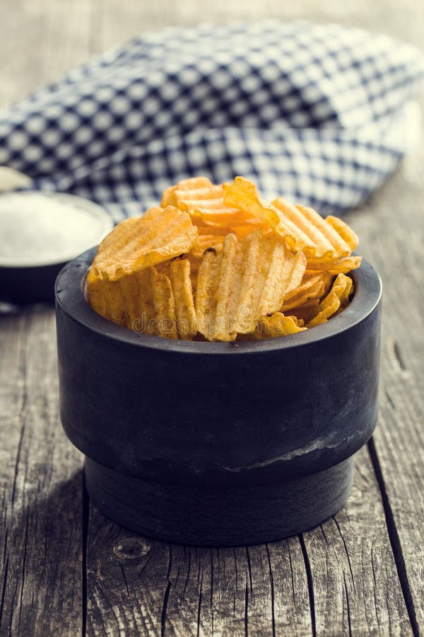 Crinkle cut potato chips. stock image. Image of chips - 72192601