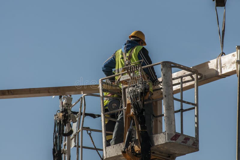 Crisis Construction in Spain. Men Working on a Building in Madrid ...