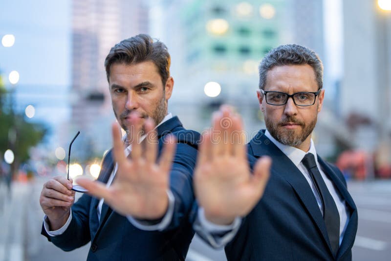 Crisis, Risk. Two Handsome Business Men in Suit Doing Stop Sing with ...