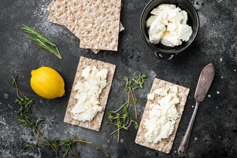 Crisp Breads with Butter, on Black Dark Stone Table Background, Top ...