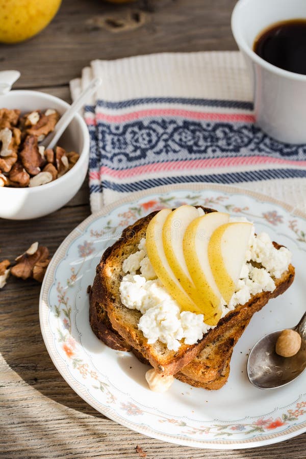 Crisp Toast for Breakfast with Sweet Cream Cheese and Pear Stock Photo ...