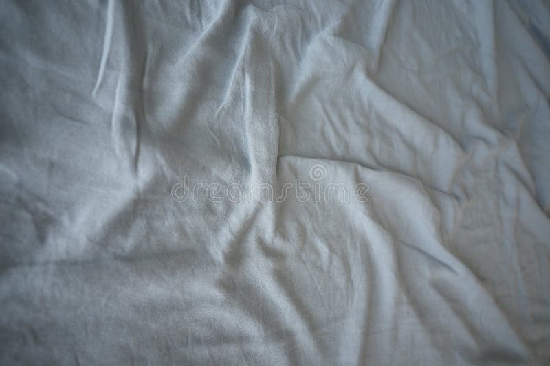 Crisp White Fabric Draped Elegantly Across a Smooth Surface Stock Photo ...