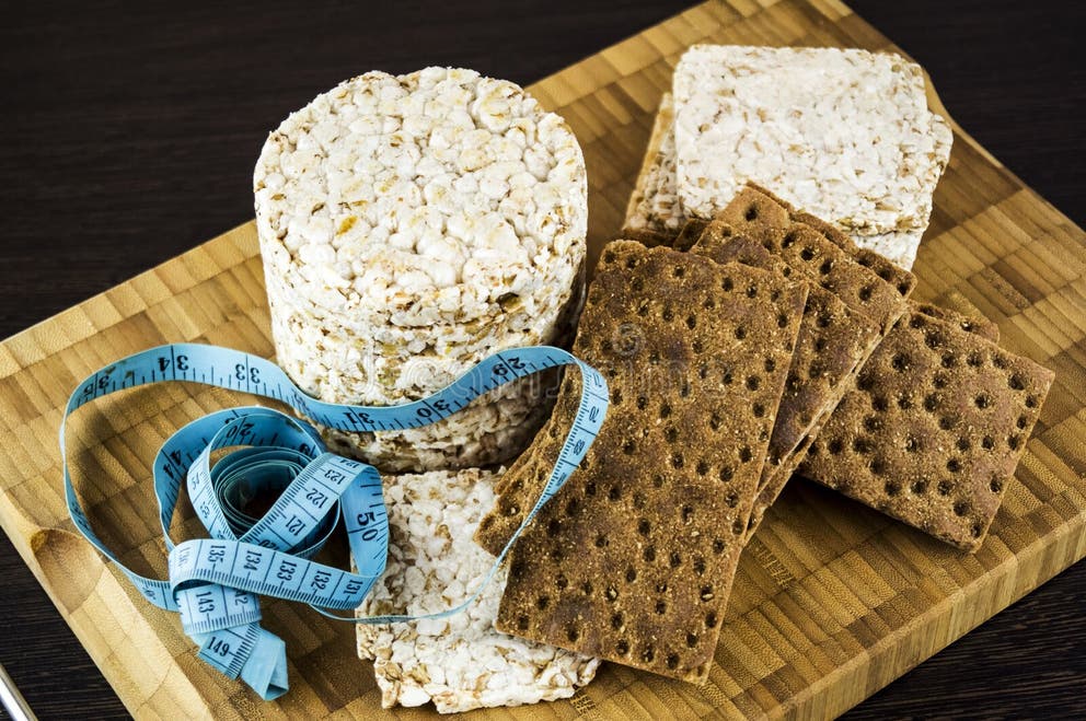 Crispbread and ruler stock image. Image of weight, inches - 65625043