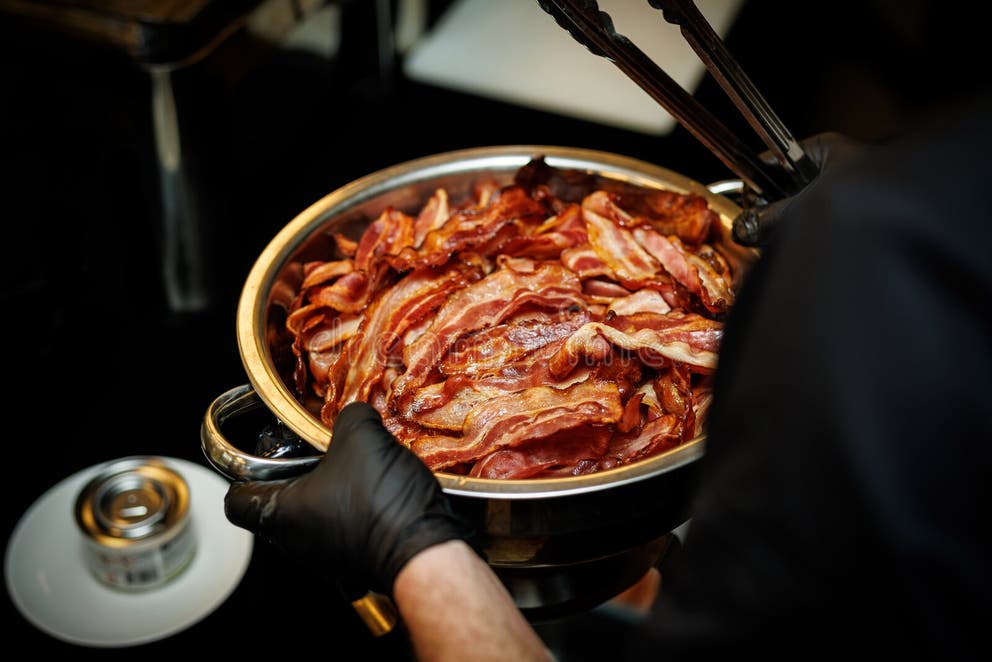 Crispy Bacon: Glistening Texture of Dry Cooked Bacon in a Chef Hands ...