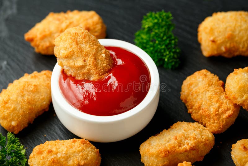 Crispy Battered Scampi Nuggets with Ketchup and Mayonnaise on Rustic ...