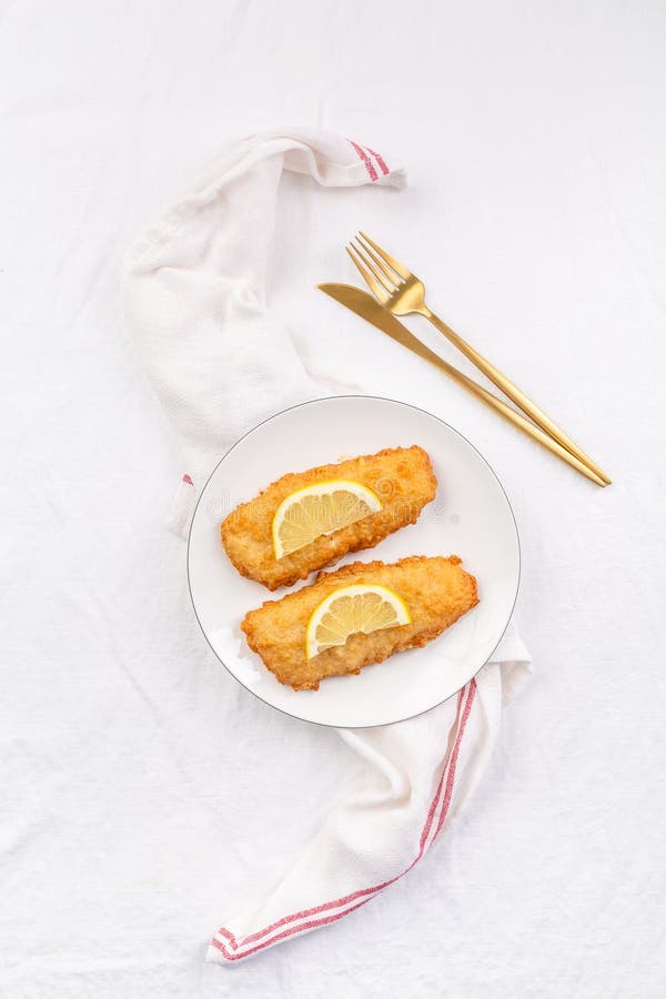 Crispy Breaded Fish with Dipping Sauce and Lemon Stock Photo - Image of ...