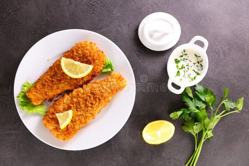 Crispy breaded fish fillet stock photo. Image of fish - 210658650